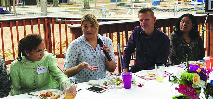 Diverse Community Members Break Bread Together To Strengthen Ties ...